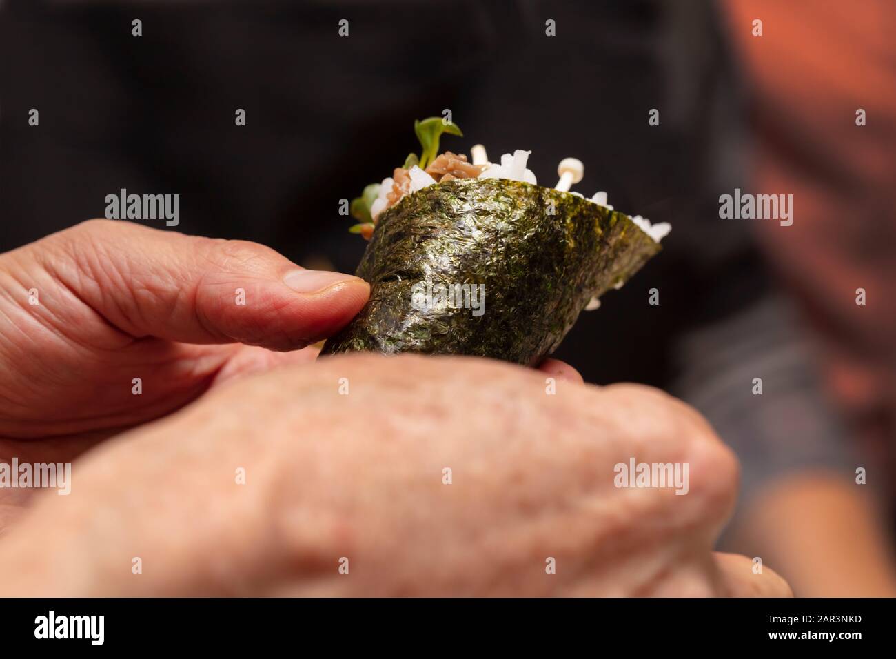 Chef's demonstration on how to make Shushi Cone rolls with rice ...