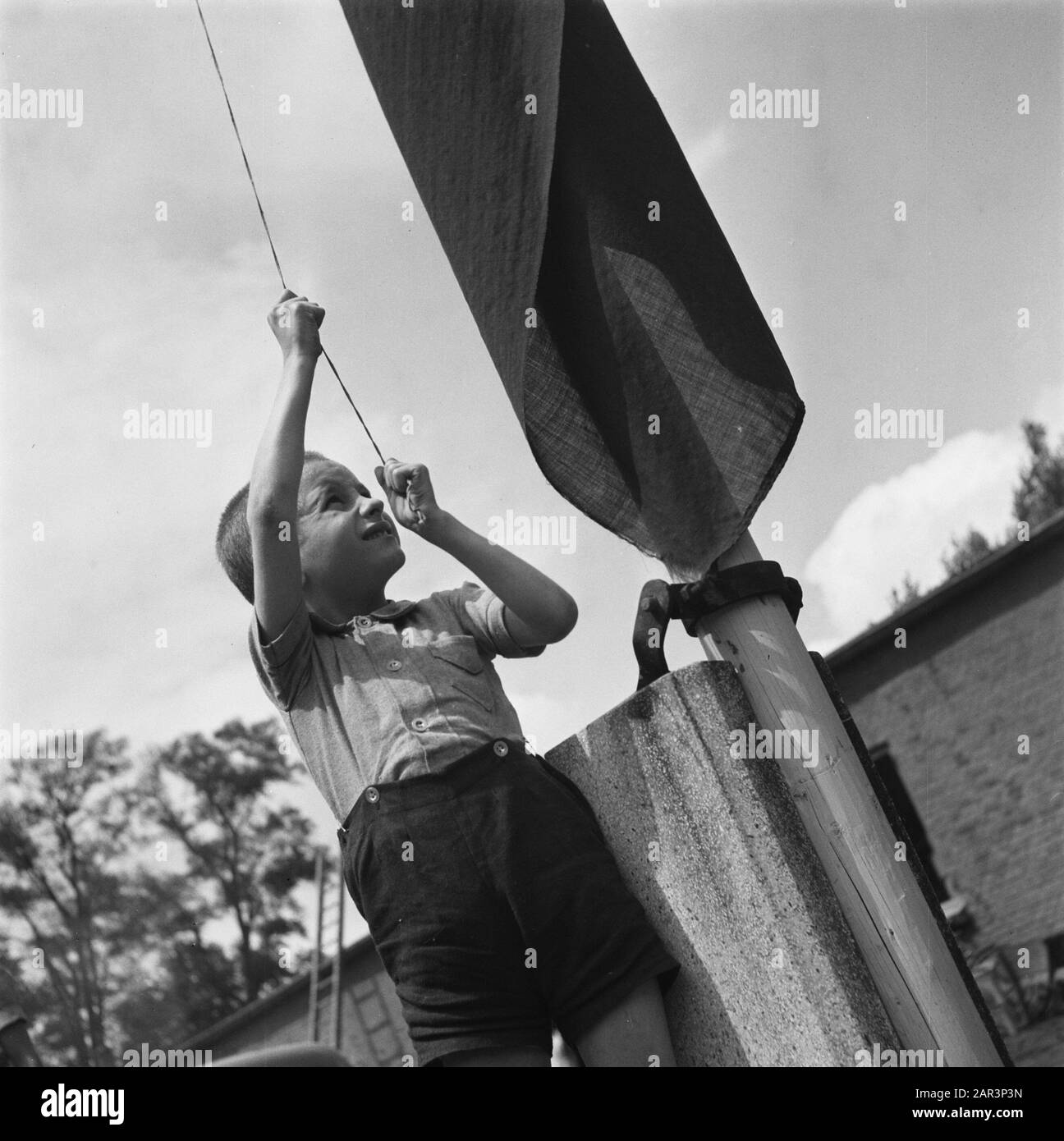 Boy hoists hi-res stock photography and images - Alamy