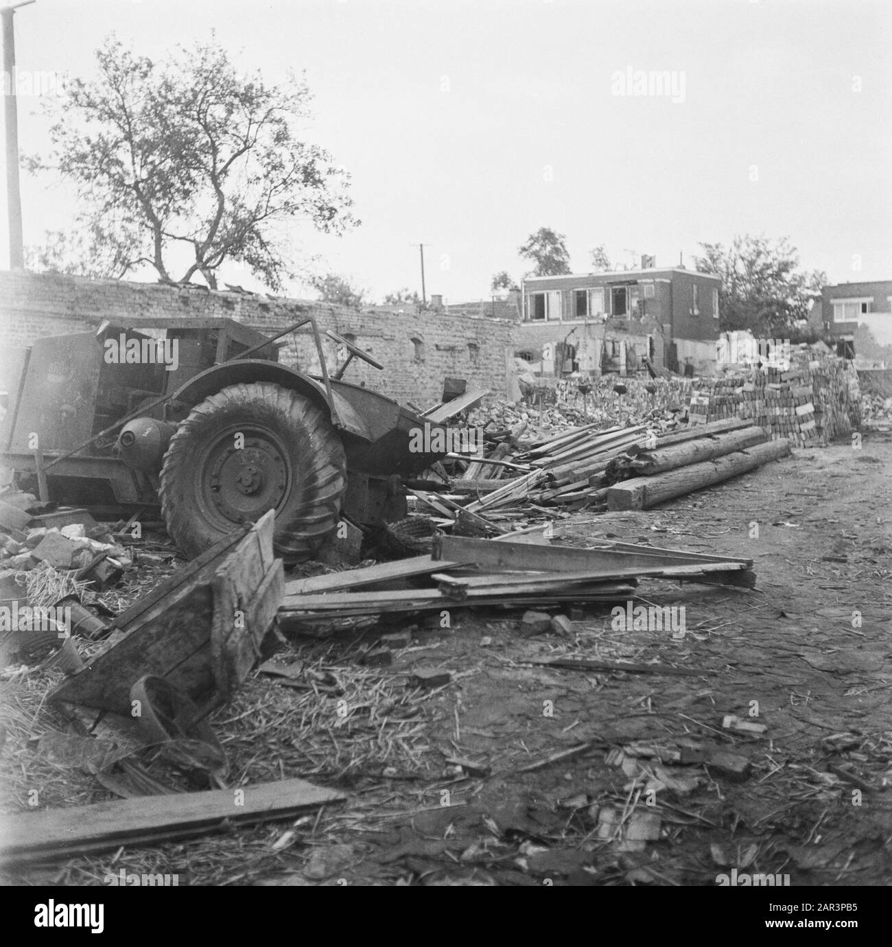 Devastations: Groningen Collecting place of debris. Stacked bricks and ...