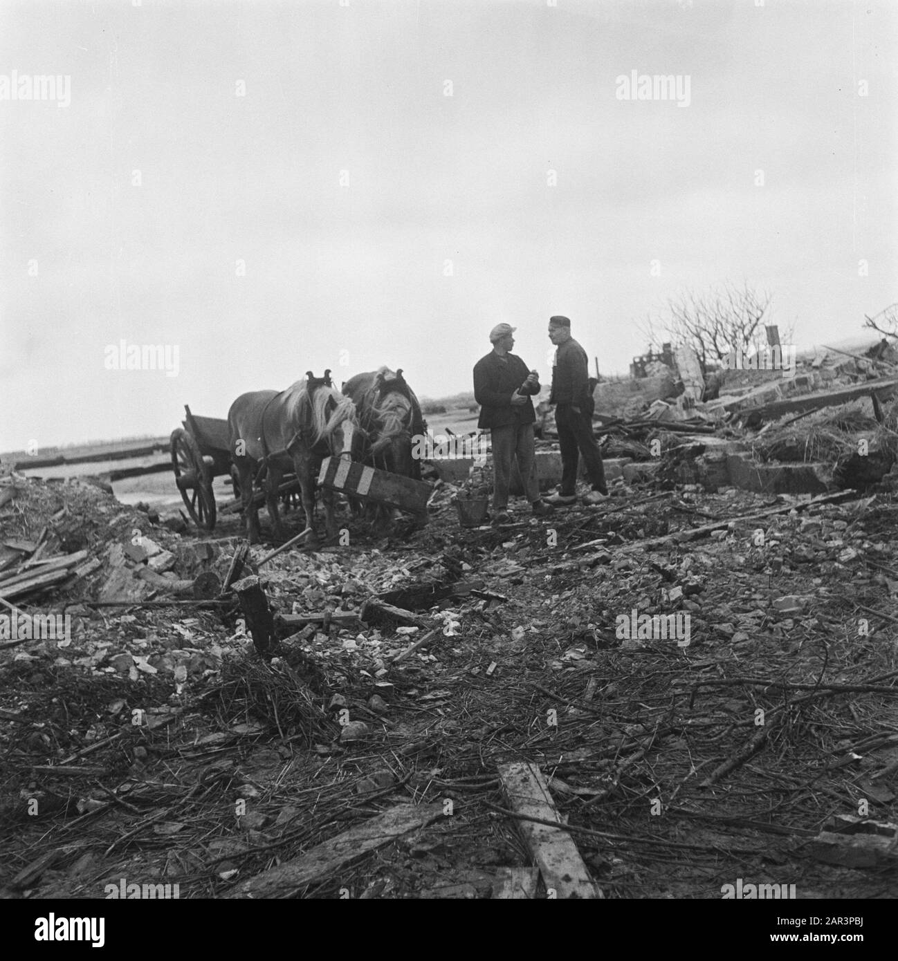 Devastations: Westkapelle Two farmers with diversion Date: 1945 ...