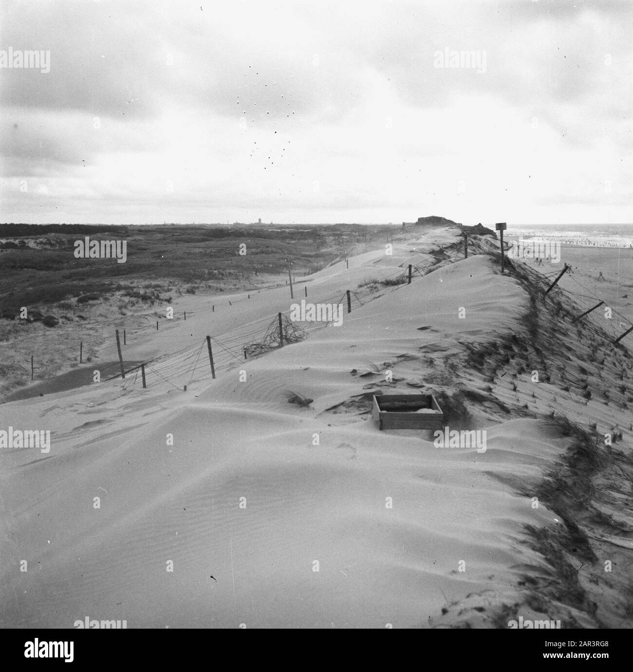 Sand sprains at the coast Dune with barbed wire barrier Date: 1945 ...