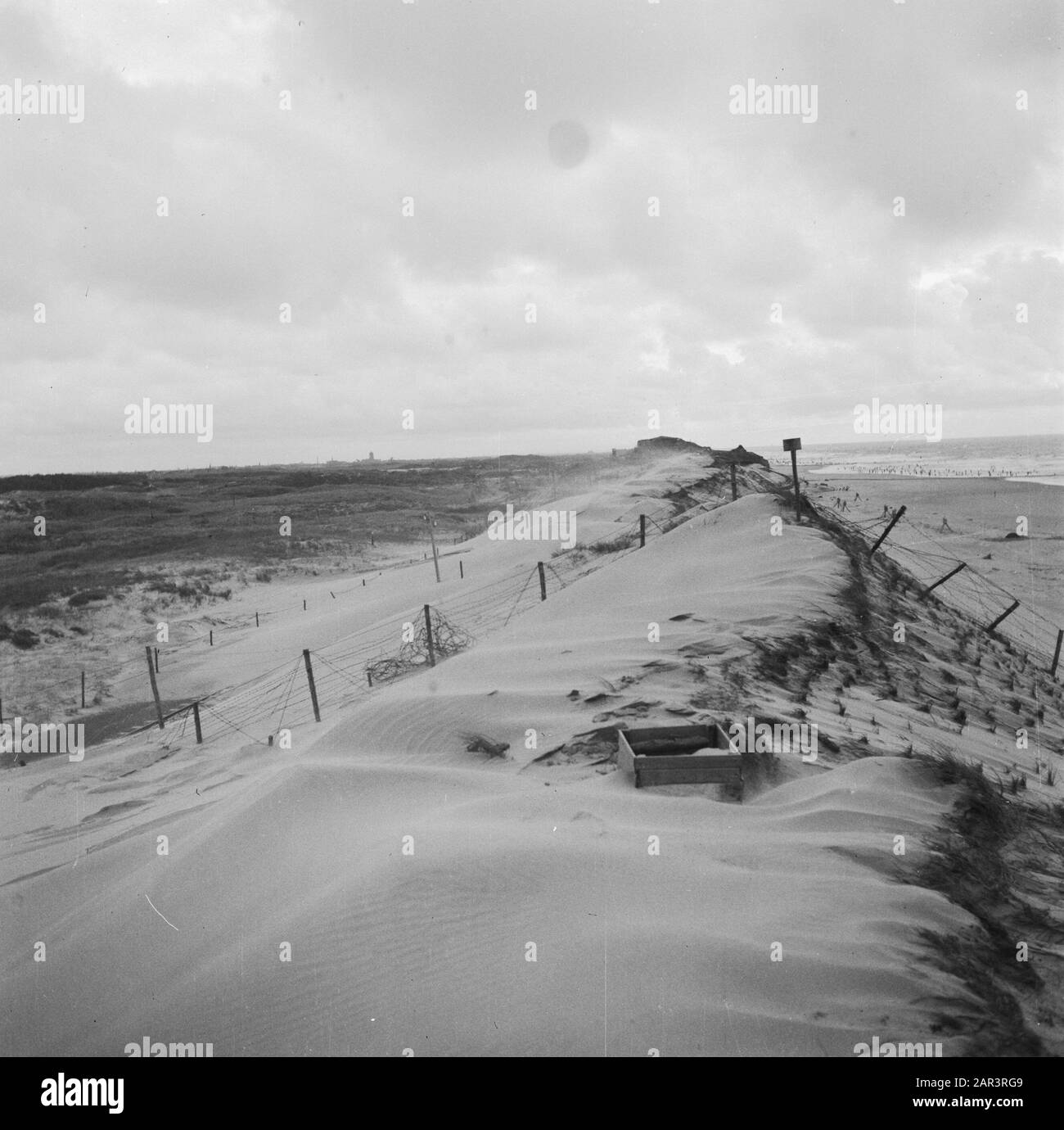 Sand sprains at the coast Dune with barbed wire barrier Date: 1945 ...