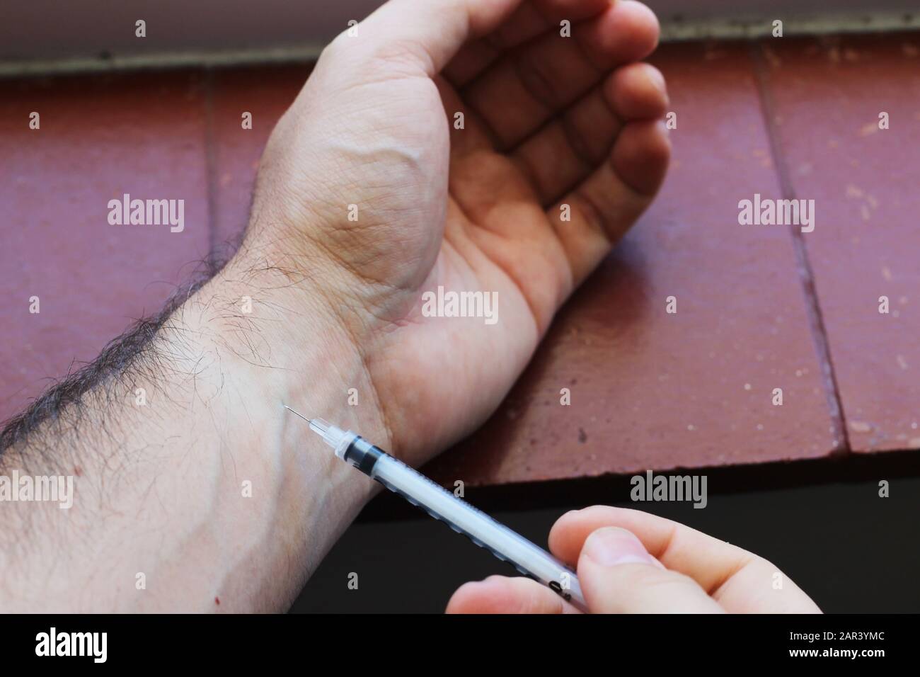 Blood injection wrist hi-res stock photography and images - Alamy