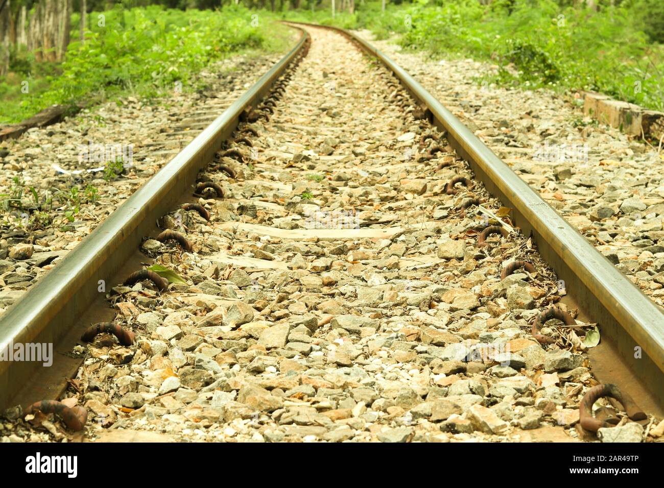 Railroad tracks heading straight ahead. Railway tracks and gravel Stock ...