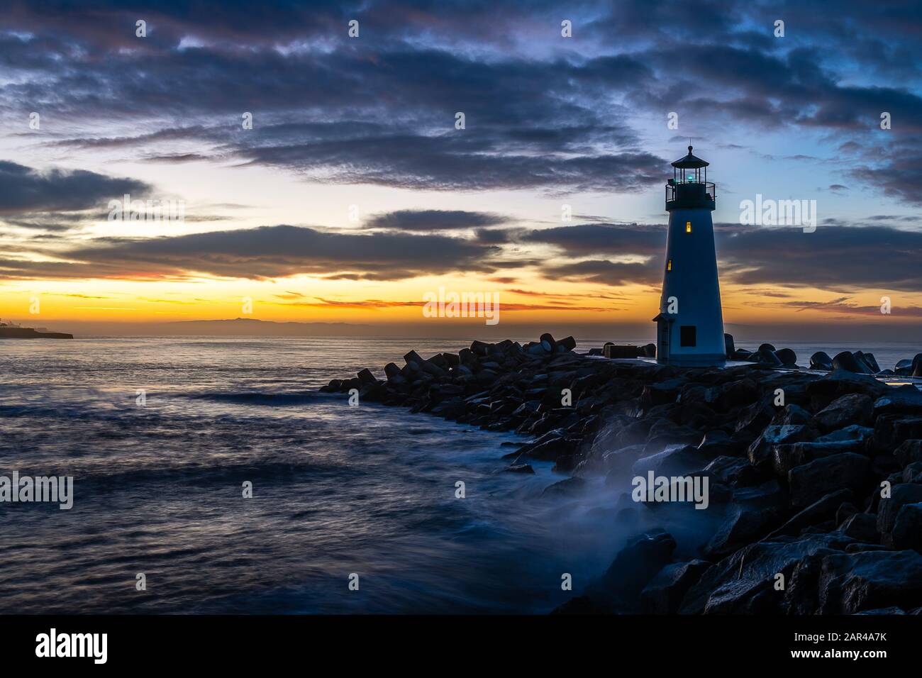 Breakwater Lighthouse at Dawn Stock Photo - Alamy