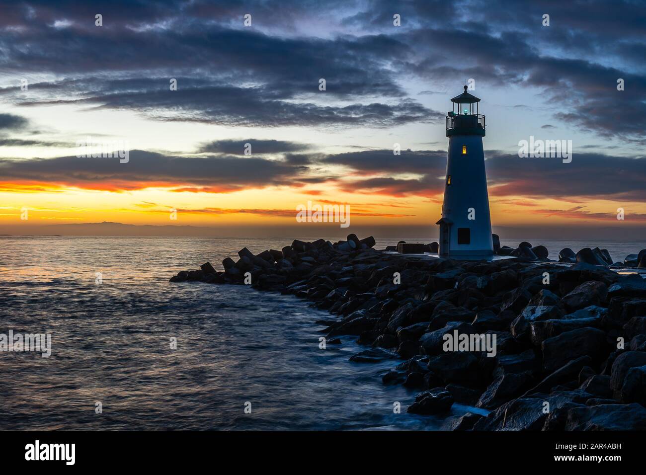 Breakwater Lighthouse at Dawn Stock Photo - Alamy