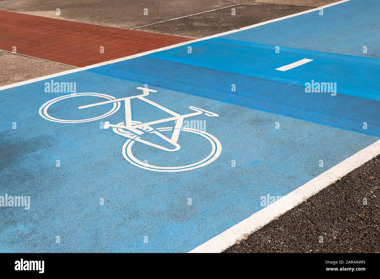 Bicycle lane in the park. Symbol for bicycle lane Stock Photo - Alamy