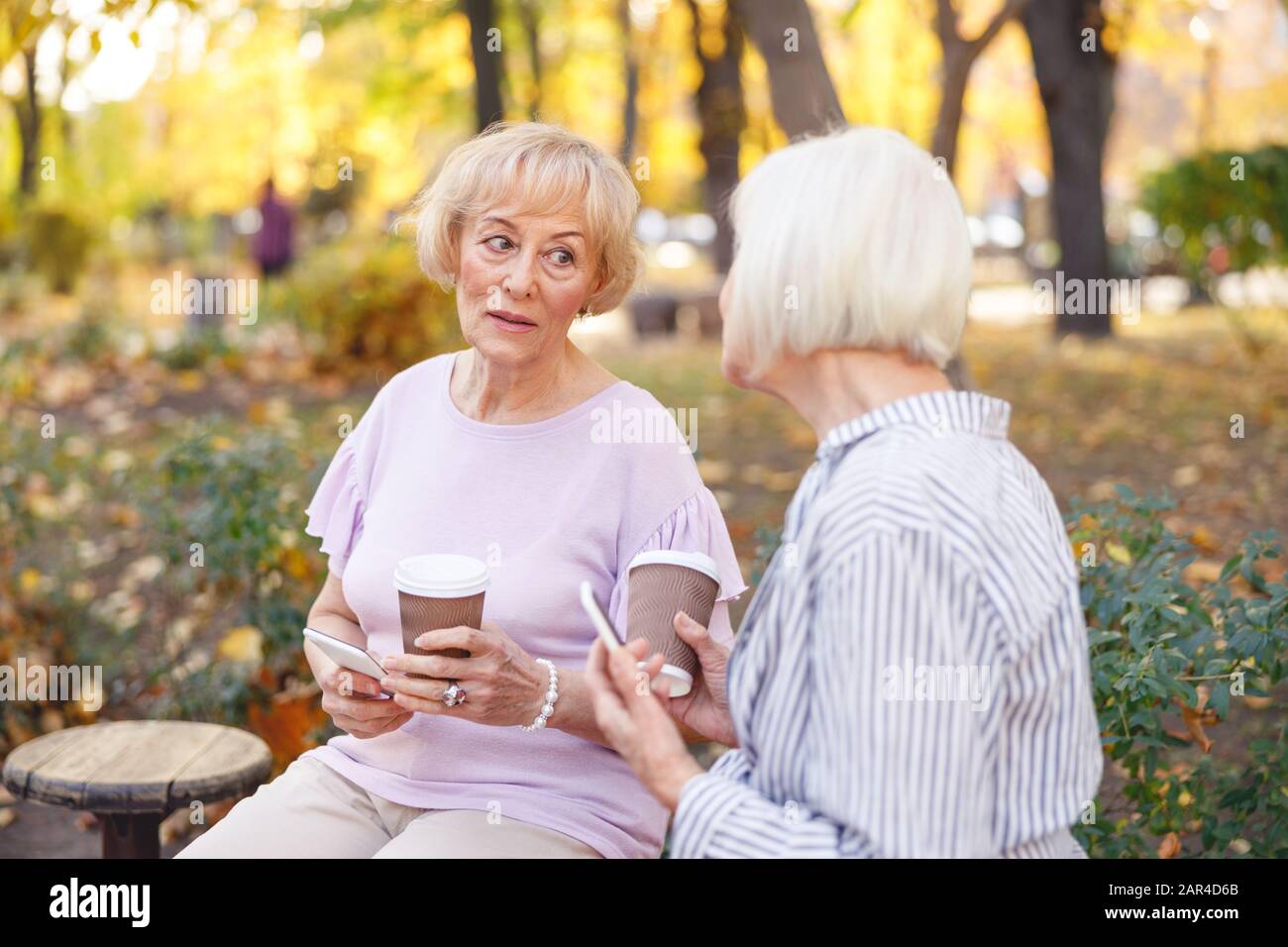 Mates telling hi-res stock photography and images - Alamy