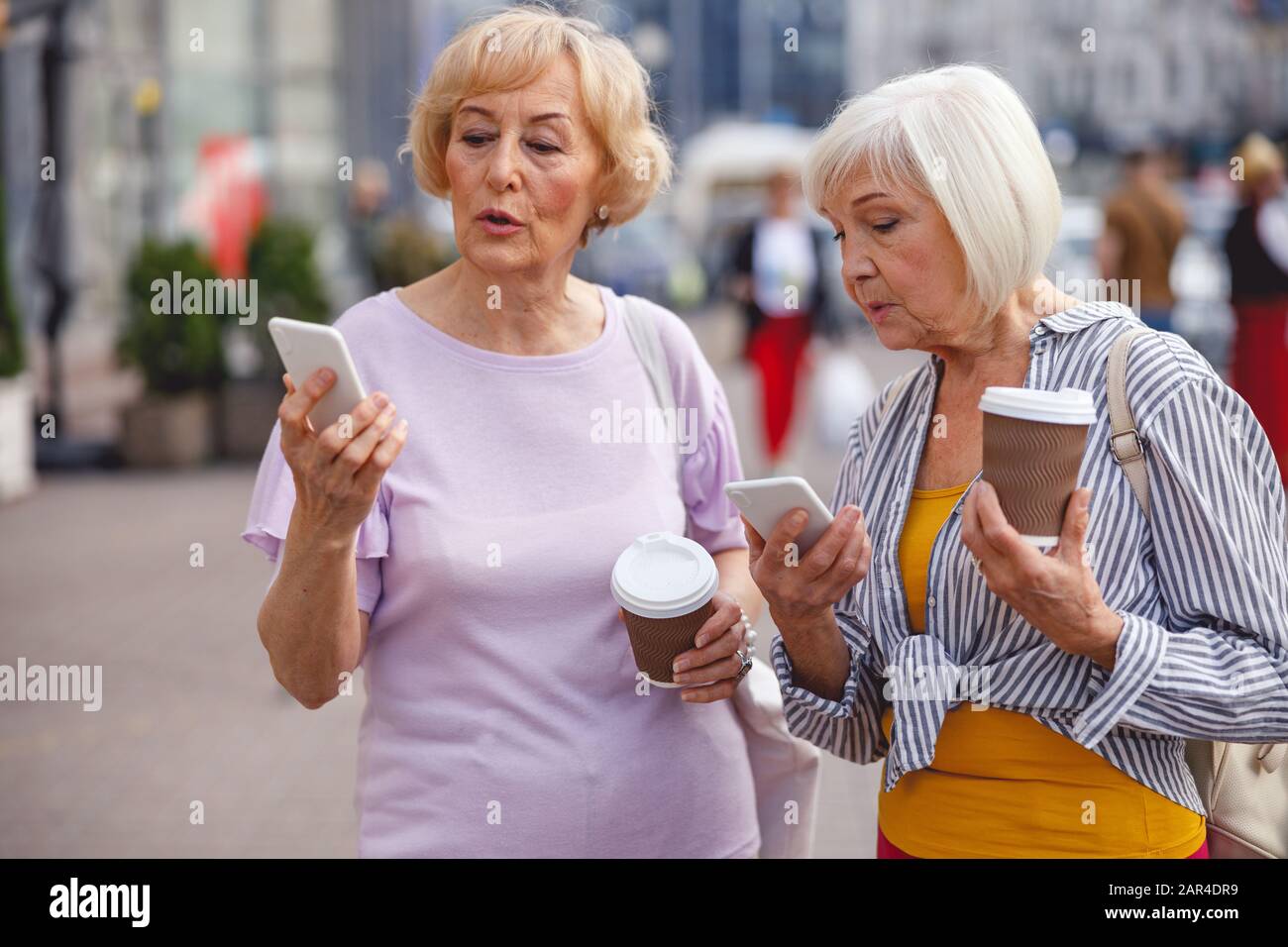 Women finding out their way to the sightseeings Stock Photo - Alamy