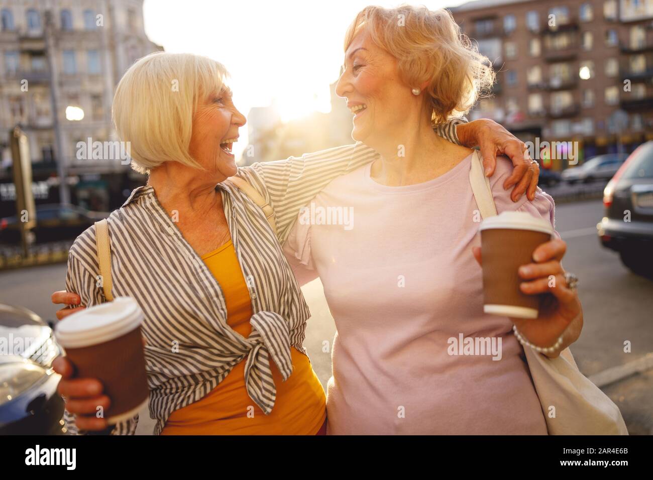 Two mates enjoying their evening walk together Stock Photo - Alamy