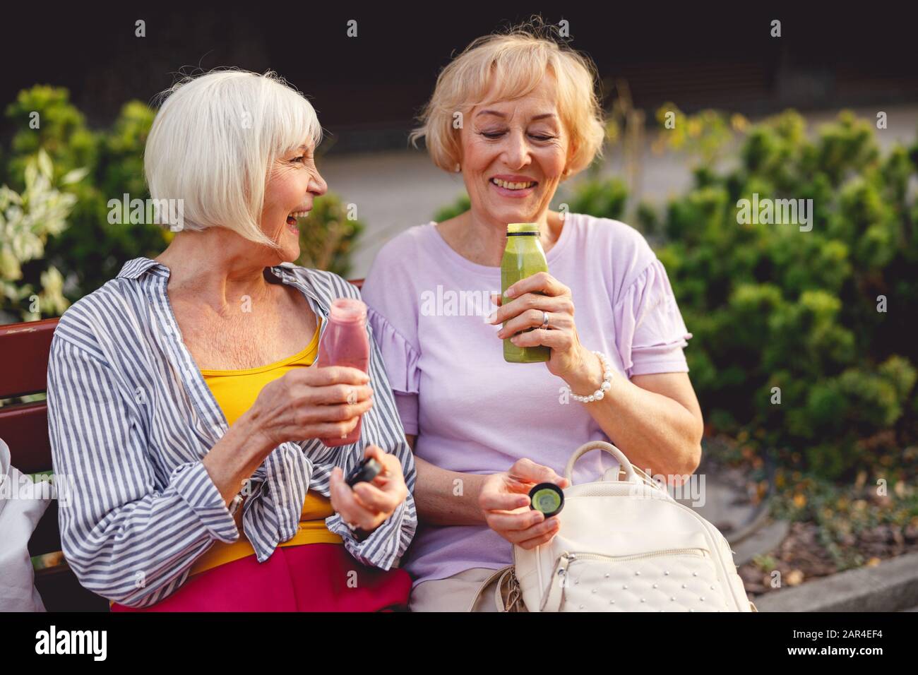 Happy ladies having a healthy snack together Stock Photo - Alamy