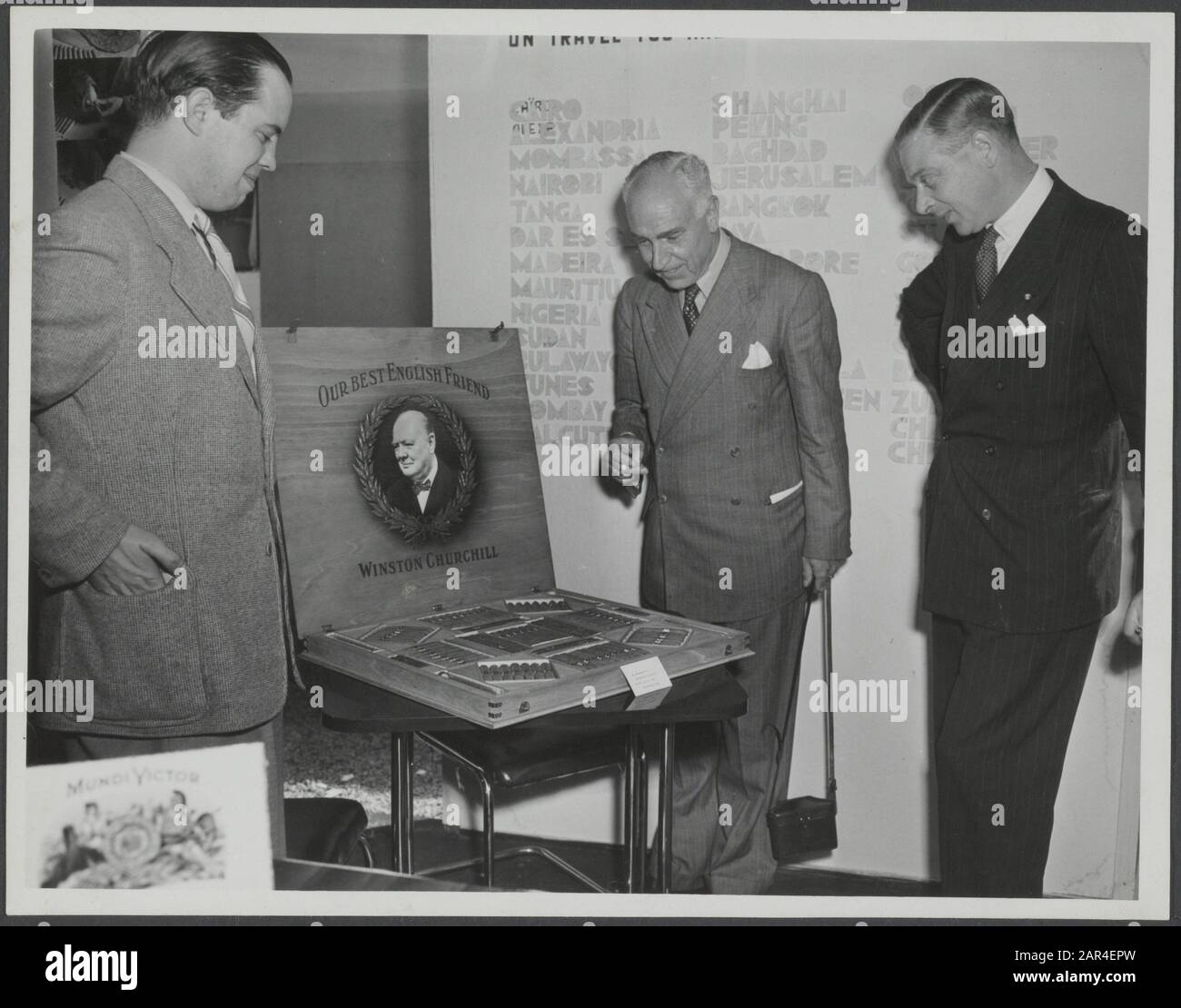 Fisherman miscellaneous Three men at a large box of different cigars ...