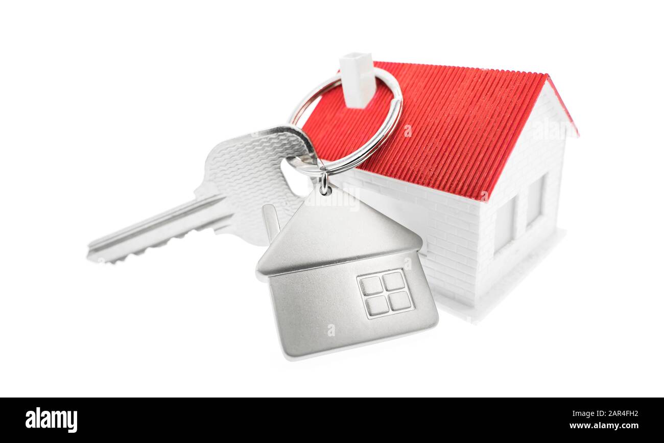 key chain with house symbol and keys on white background,Real estate ...