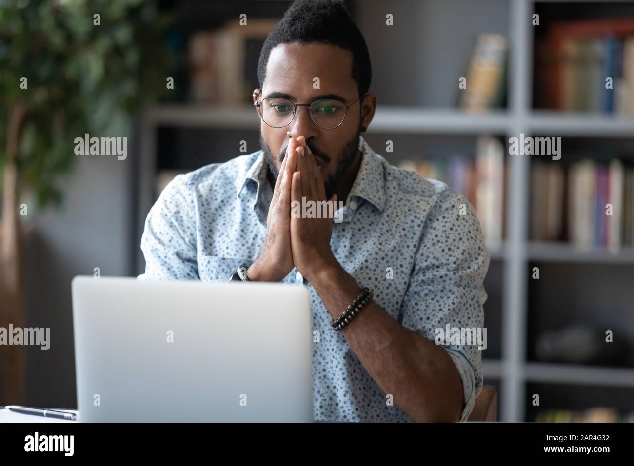 Frustrated man looking laptop screen hi-res stock photography and ...