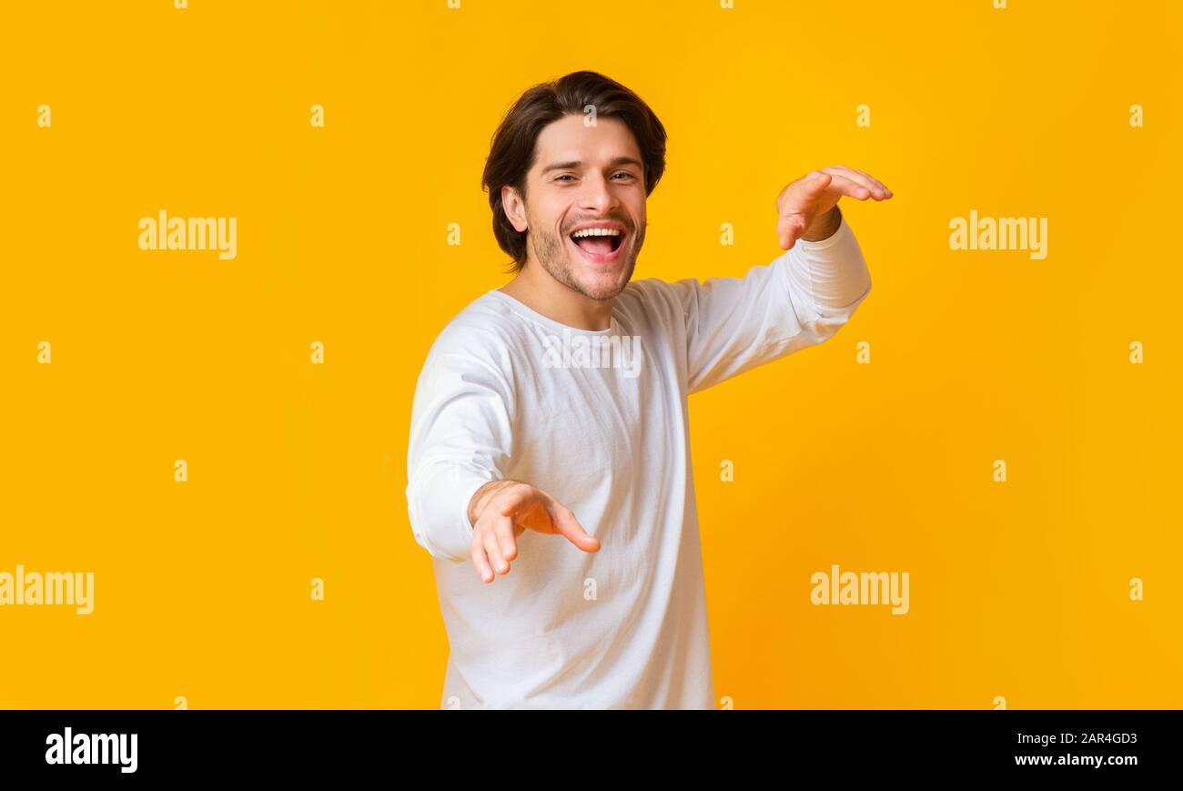 Man dancing smiling camera party hi-res stock photography and images ...