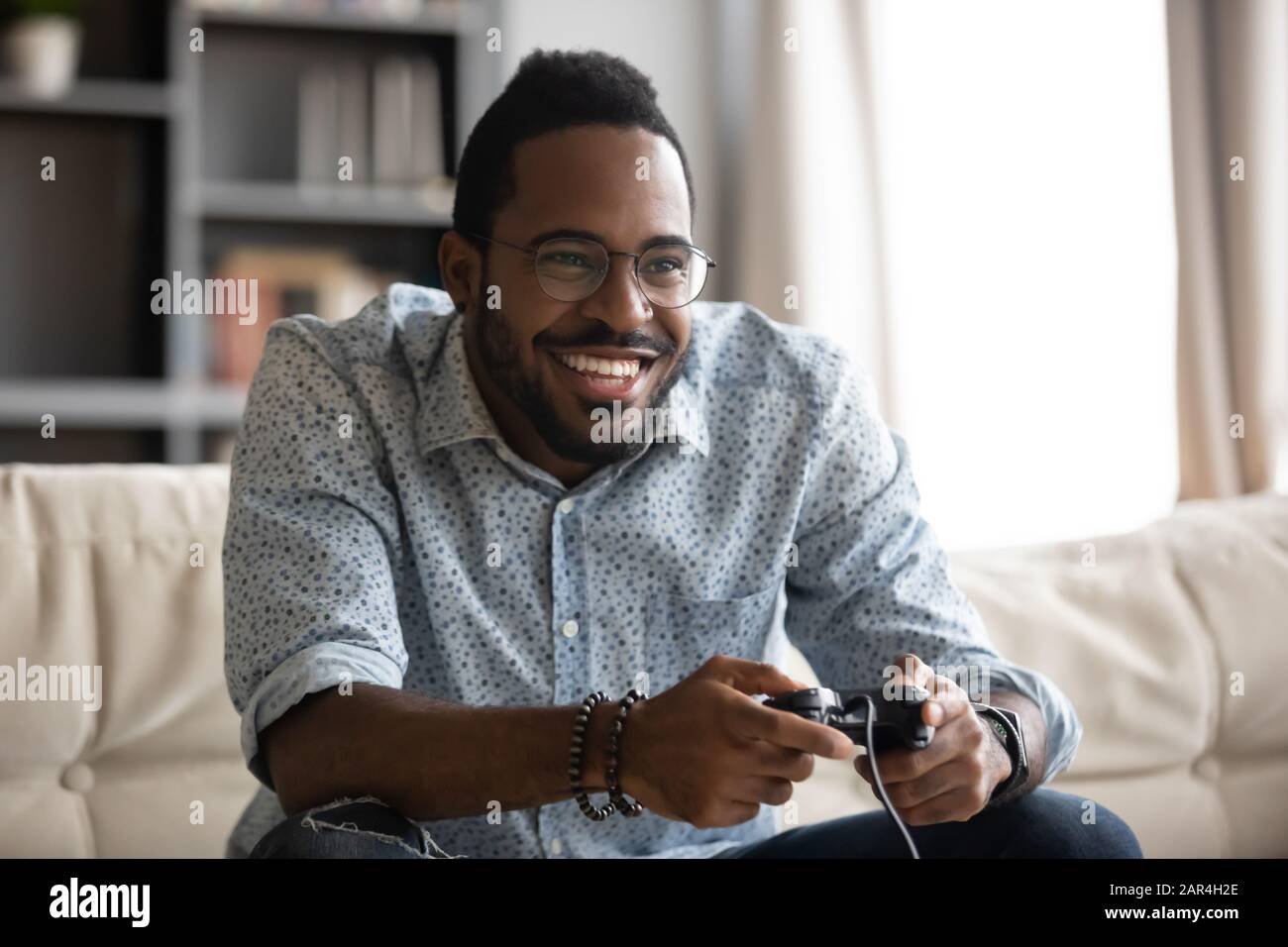 Male playstation controller hi-res stock photography and images - Alamy