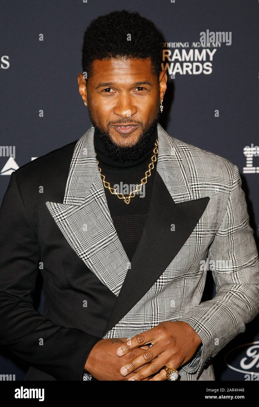 BEVERLY HILLS, CALIFORNIA - JANUARY 25: Usher attends the Pre-GRAMMY ...