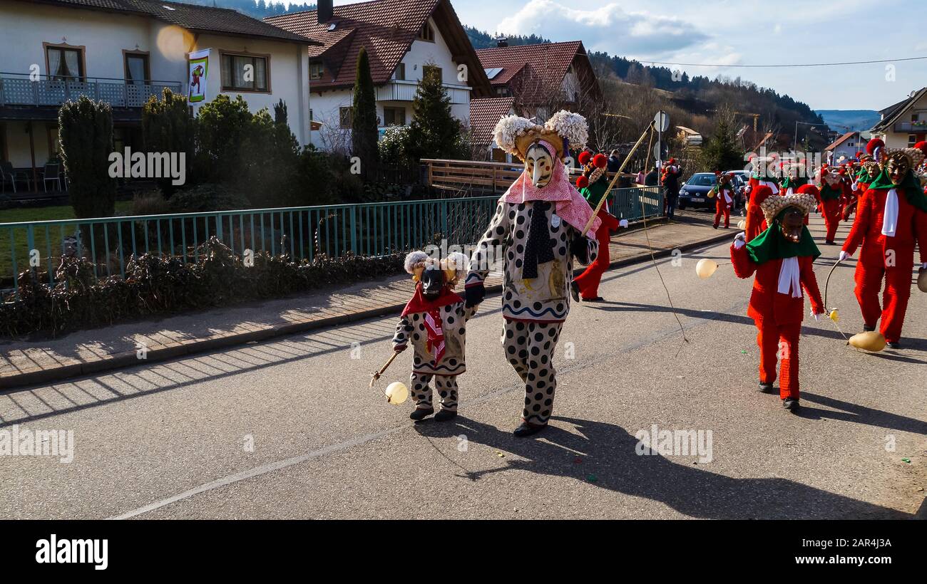 Elzach, Germany, February 25, 2017, Father and child with traditional ...
