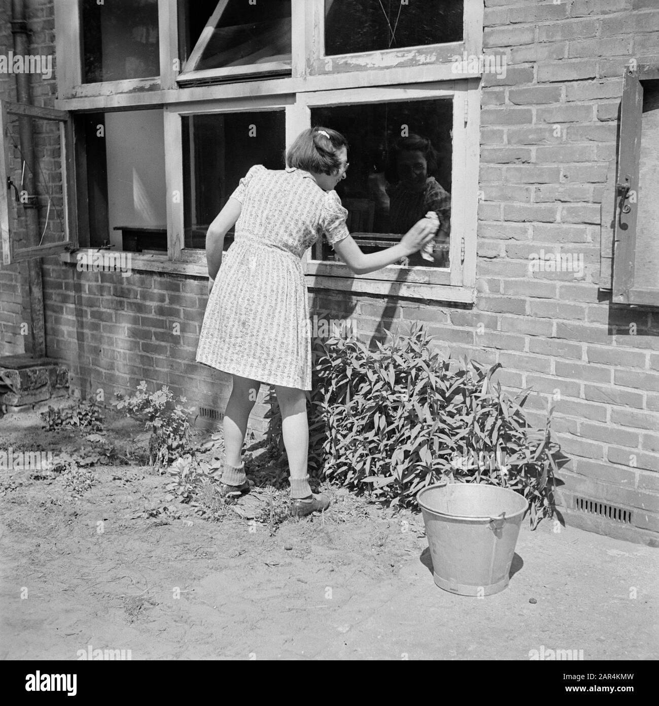 The Princesses Beatrix and Irene at the Workshop Children's Community of Kees Boeke in Bilthoven ...