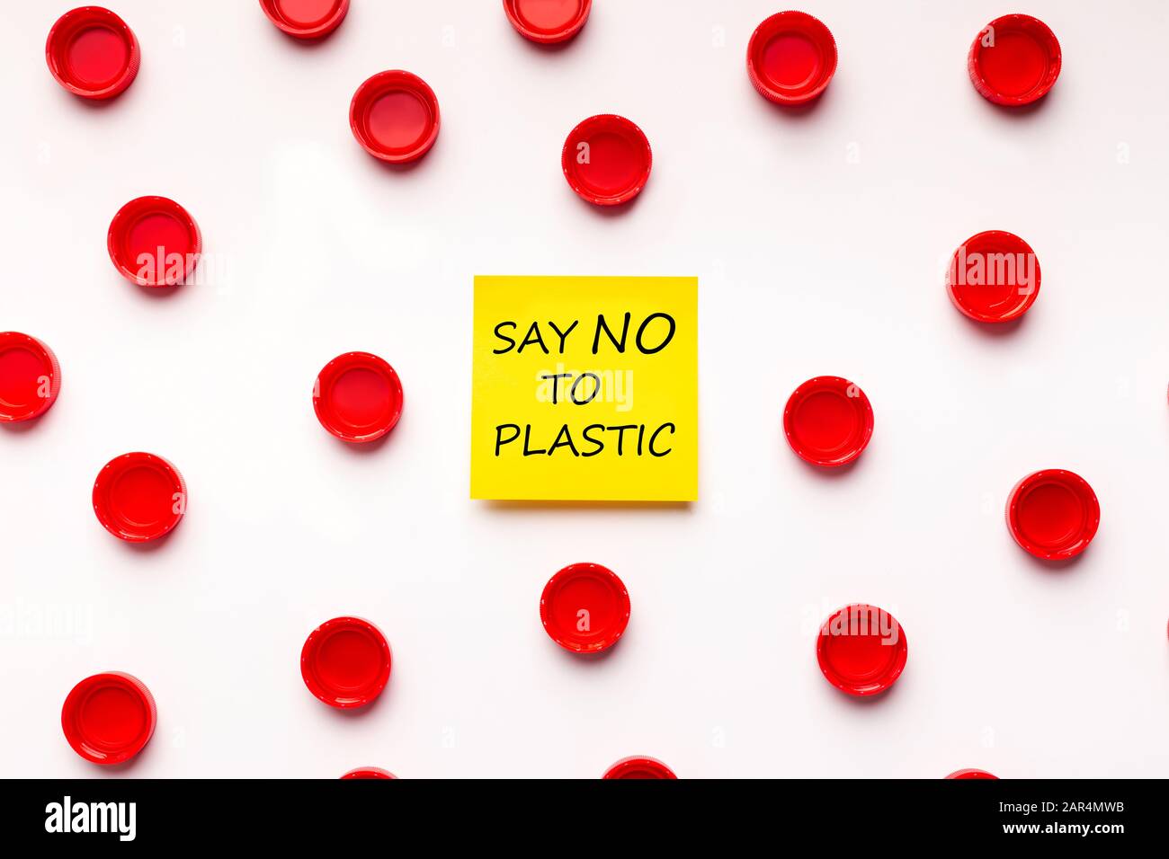 Pattern Background with colored plastic covers on white Stock Photo - Alamy