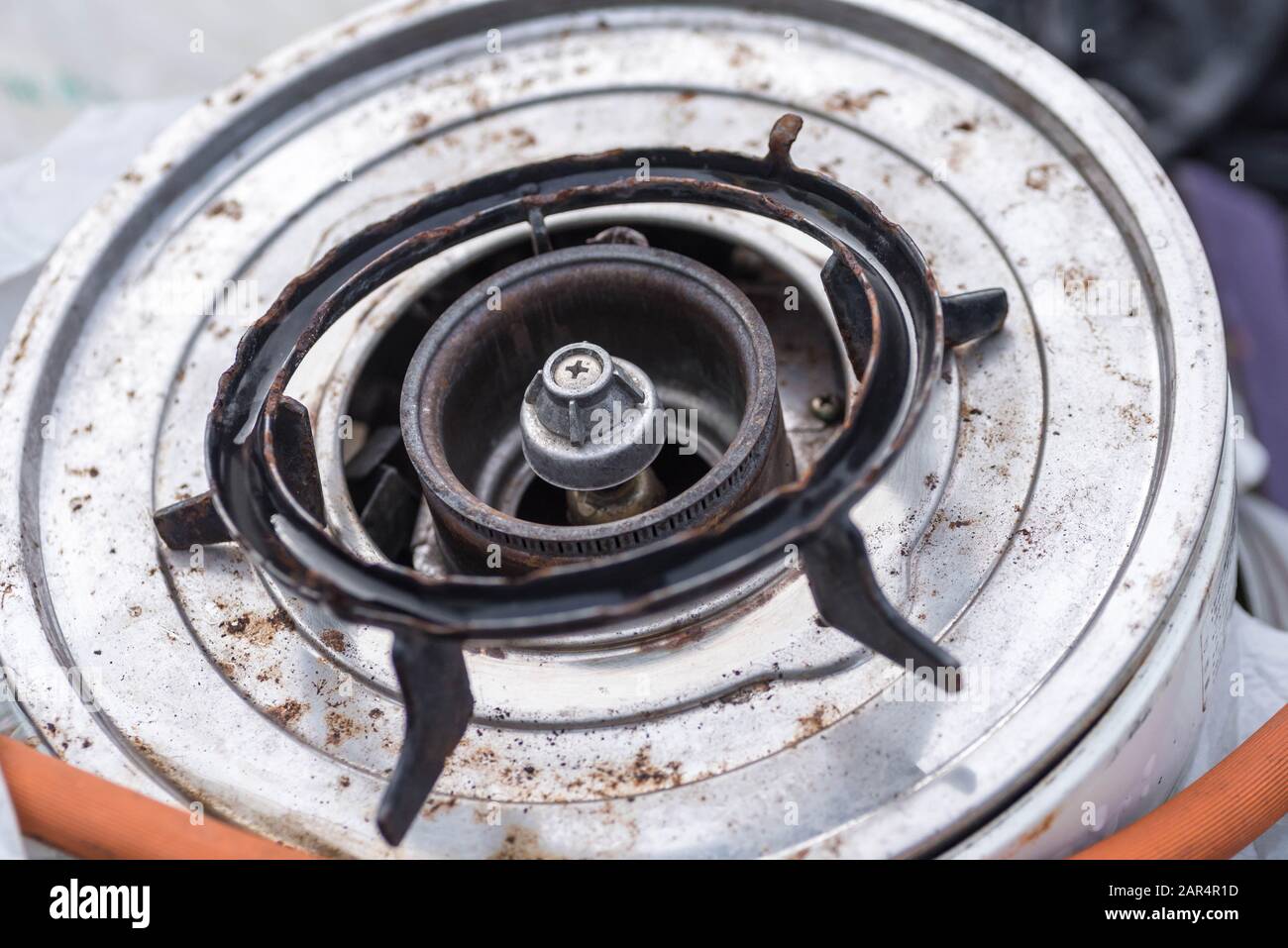 Old, rusty and garbage circular gas burner. Close up shot Stock Photo ...