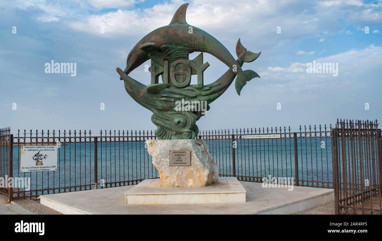 The two leaping dolphins, the symbol of Rethymno Stock Photo - Alamy