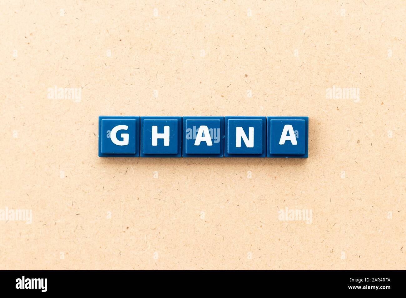 Tile letter in word Ghana on wood background Stock Photo - Alamy