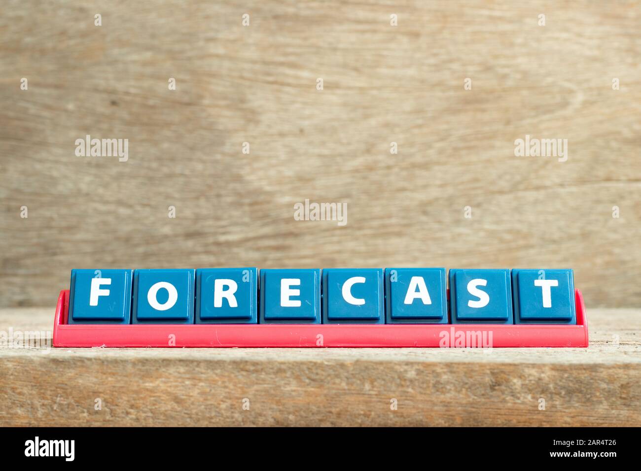 Tile letter on red rack in word forecast on wood background Stock Photo ...