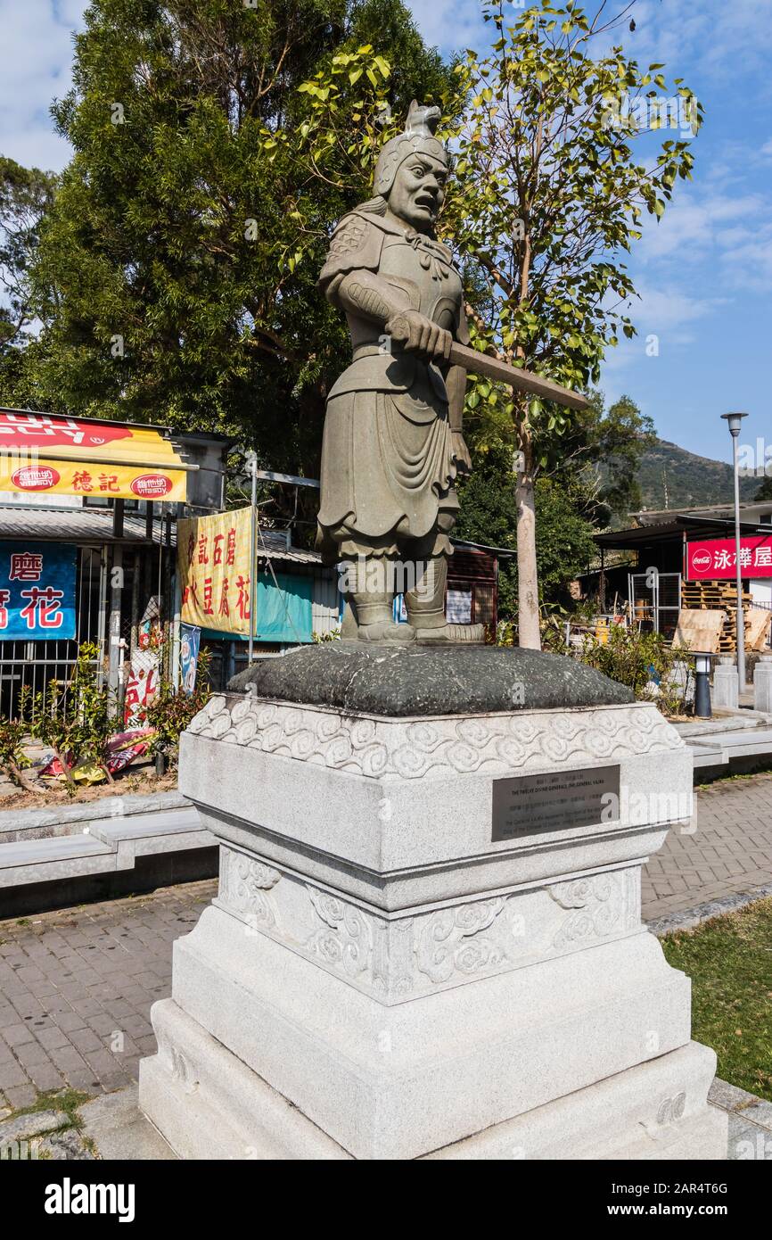 A statue of the General Vajra armed with a sword, one of the Twelve ...