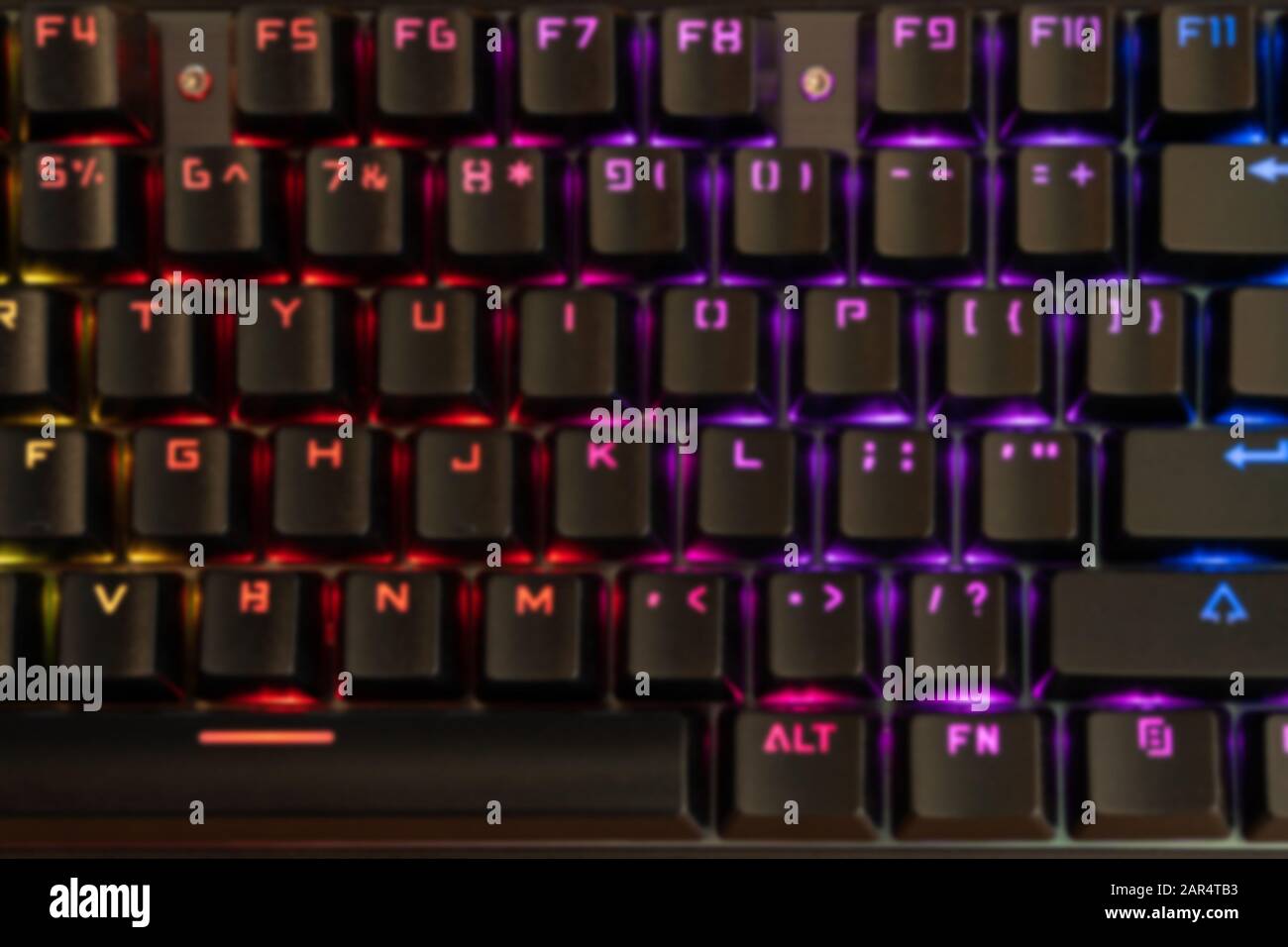 black keyboard as a blurred background Stock Photo - Alamy