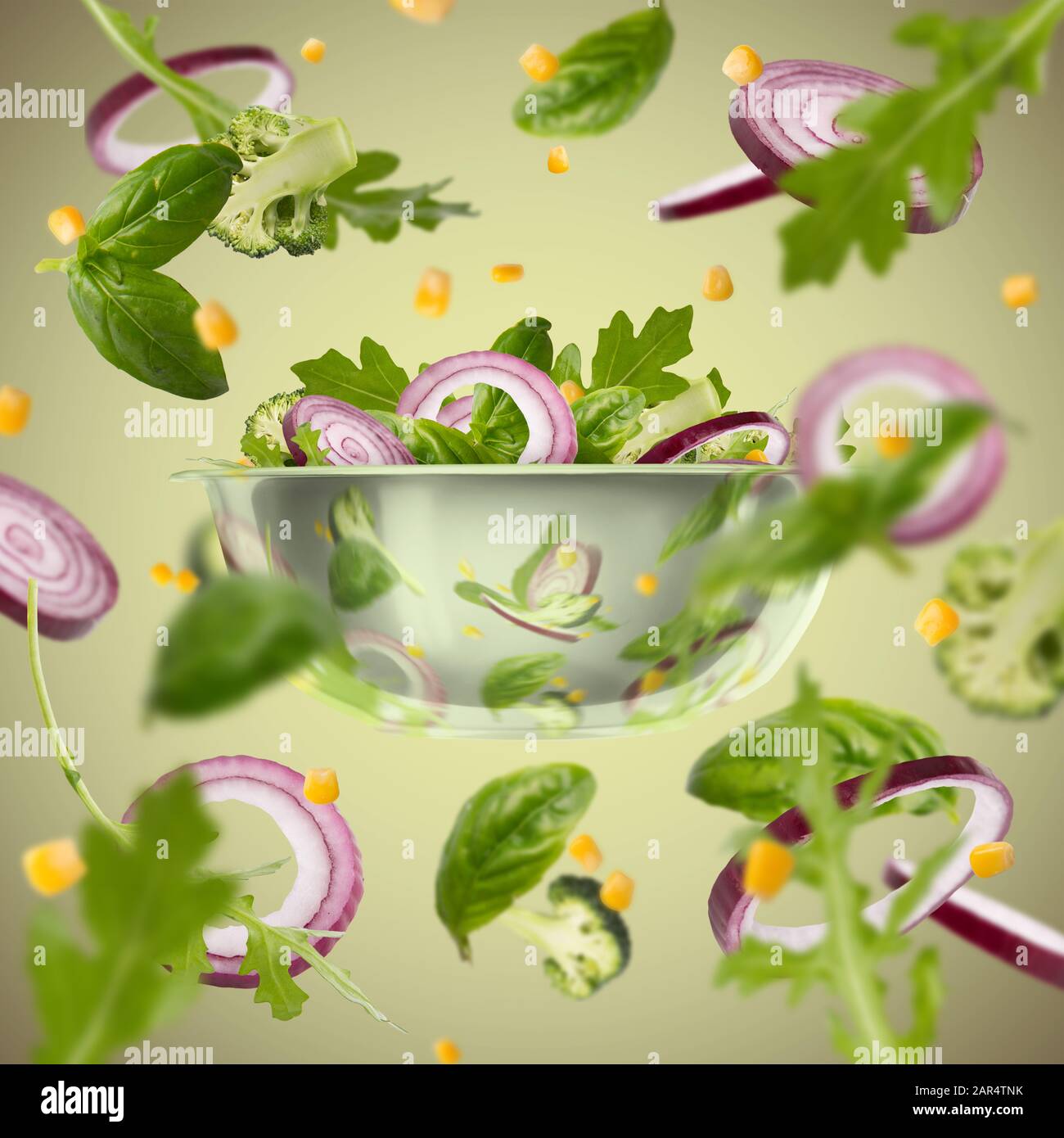 Healthy vegetarian eating and cooking with various flying chopped ...