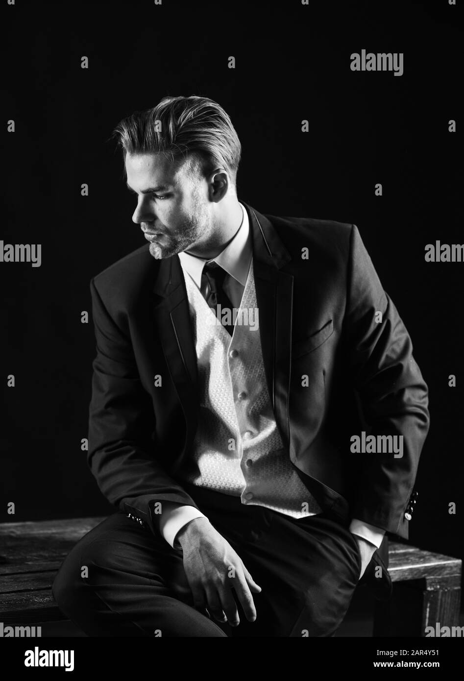 Serious Man In Classic Suit Or Businessman On Black Background