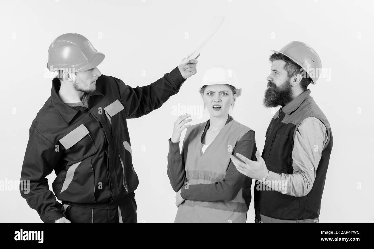 Labor dispute concept. Team of architects, engineers discussing work ...