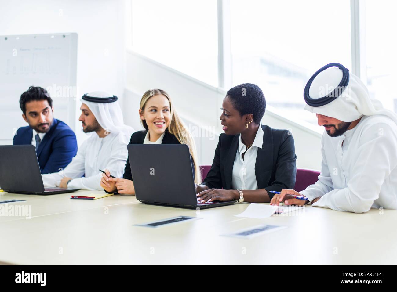 Multiracial group of business people having a meeting in a office ...