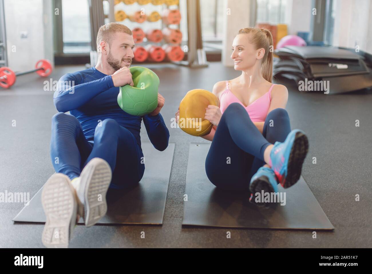 Man woman exercises gym girl fitness hi-res stock photography and ...