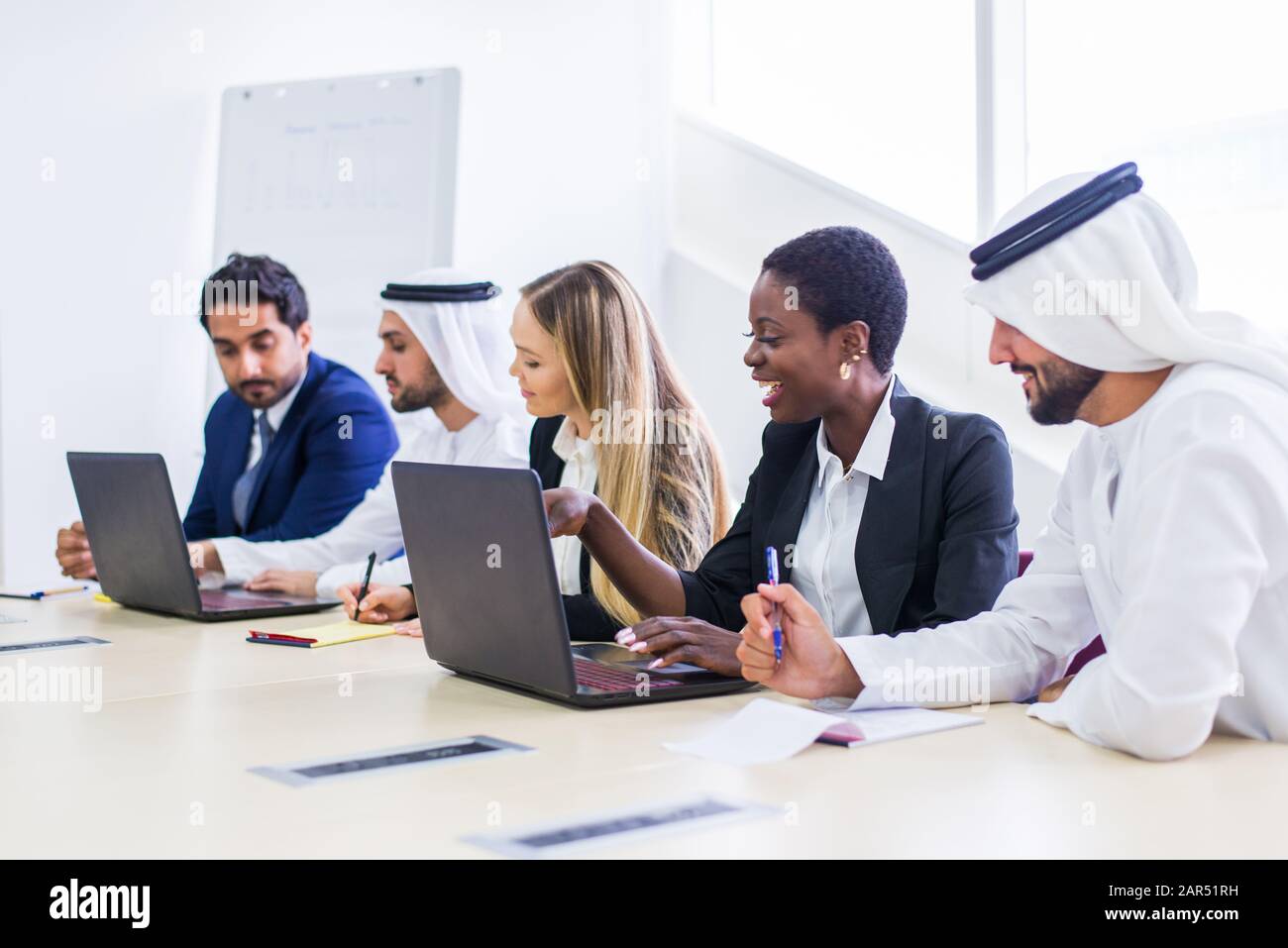 Multiracial group of business people having a meeting in a office ...