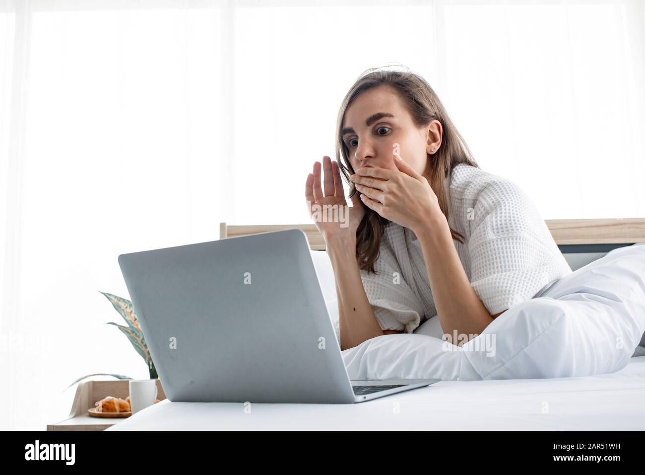 Woman shocked after waking hi-res stock photography and images - Alamy