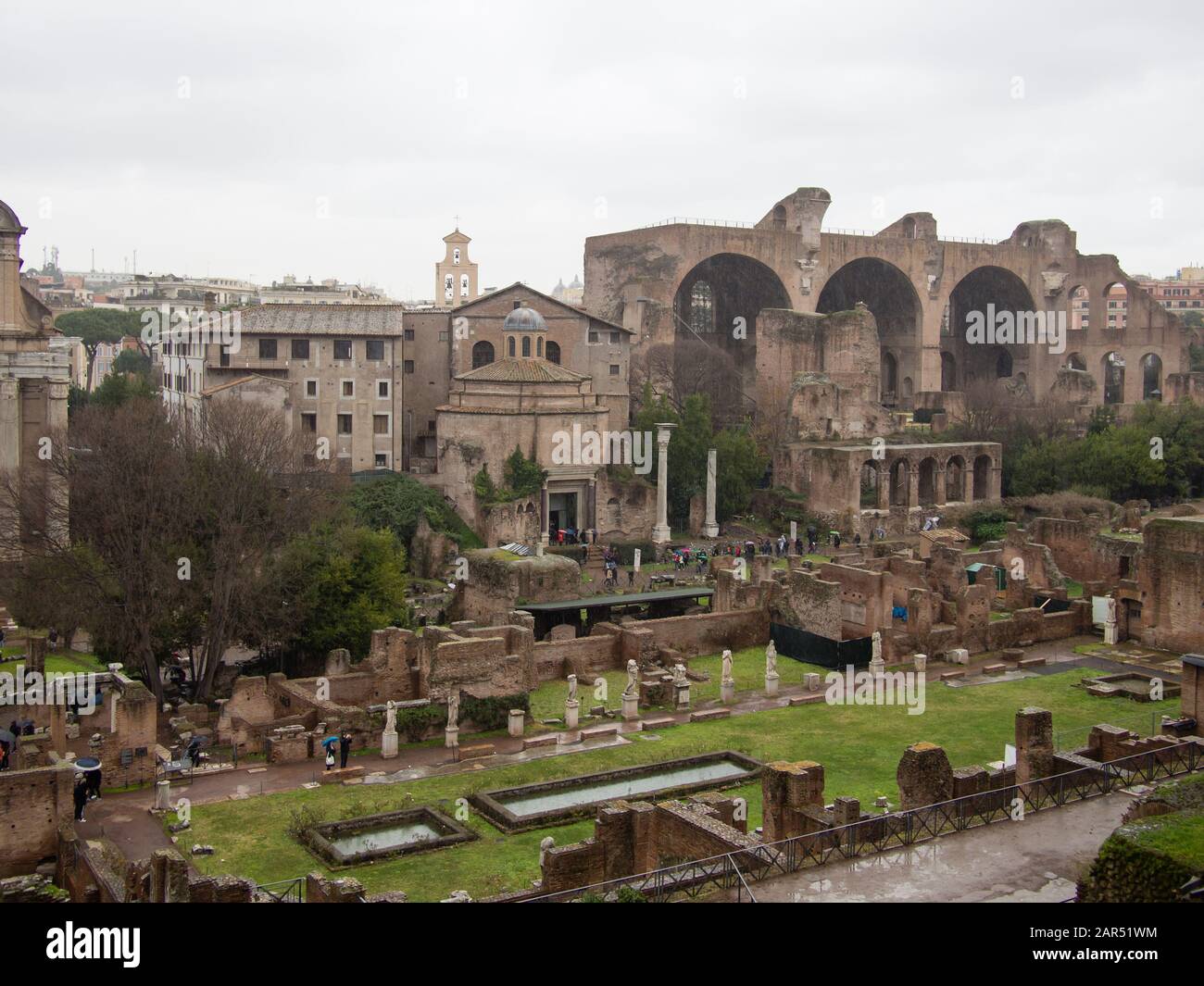 Ruins at the Roman Forum in Rome, Italy. Citizens of the ancient city ...