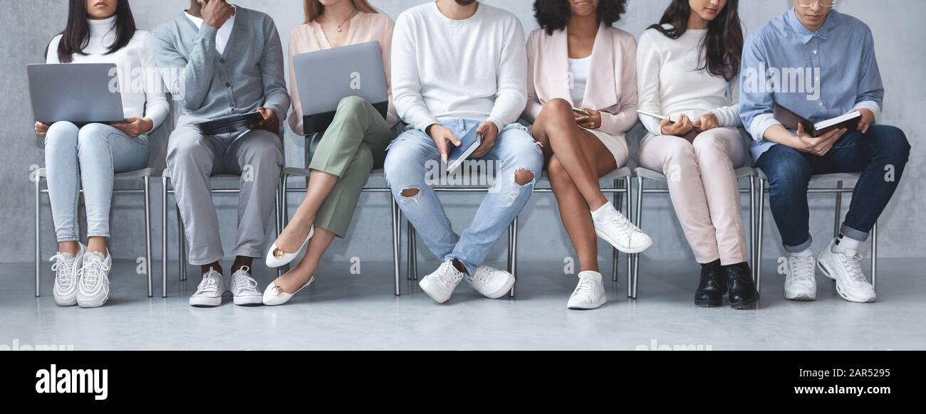 People waiting in line for job interview hi-res stock photography and ...