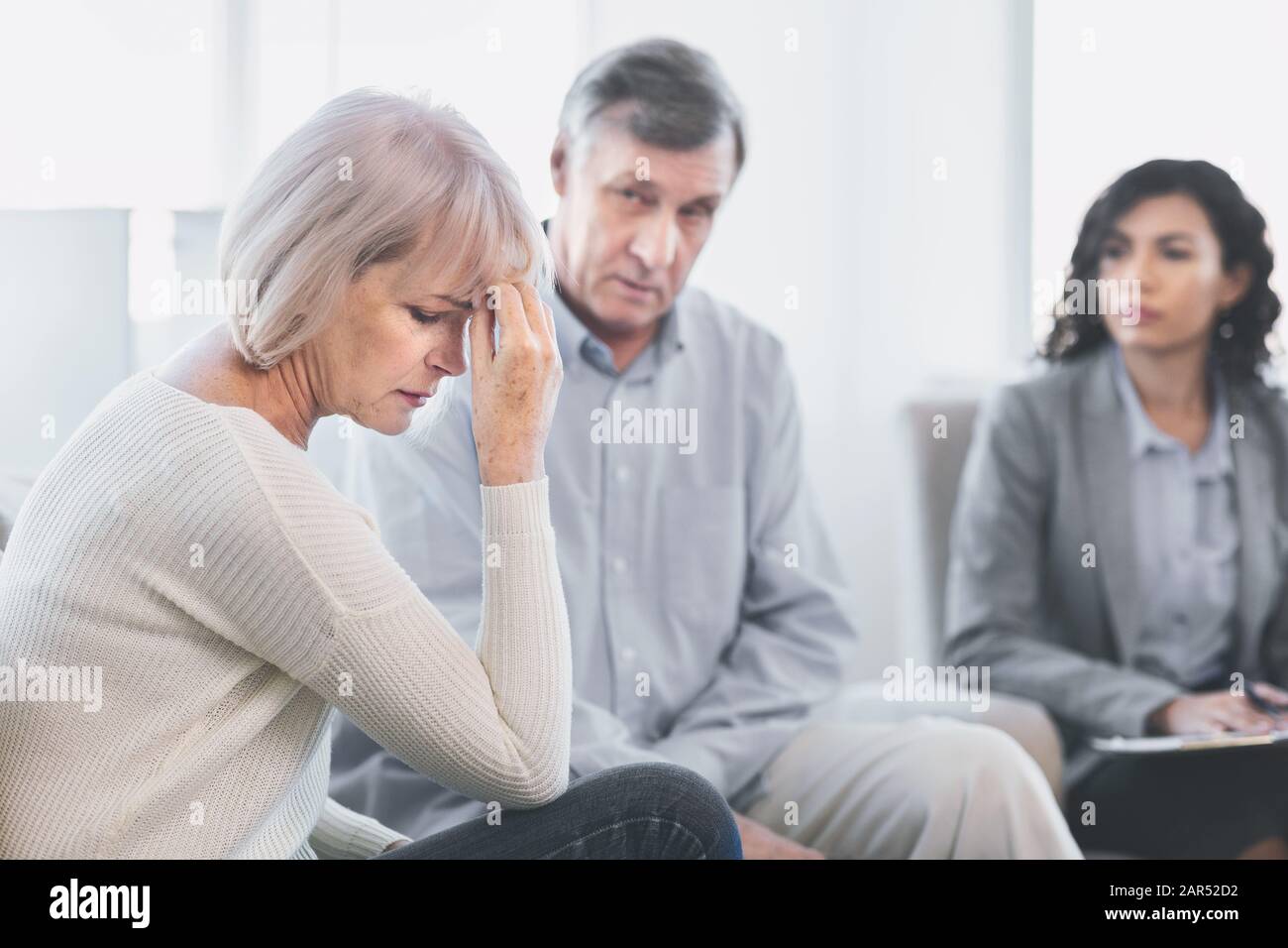 Sad husband with wife hi-res stock photography and images - Alamy