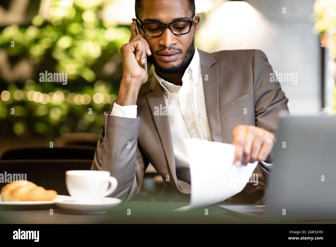 Black banker hi-res stock photography and images - Alamy