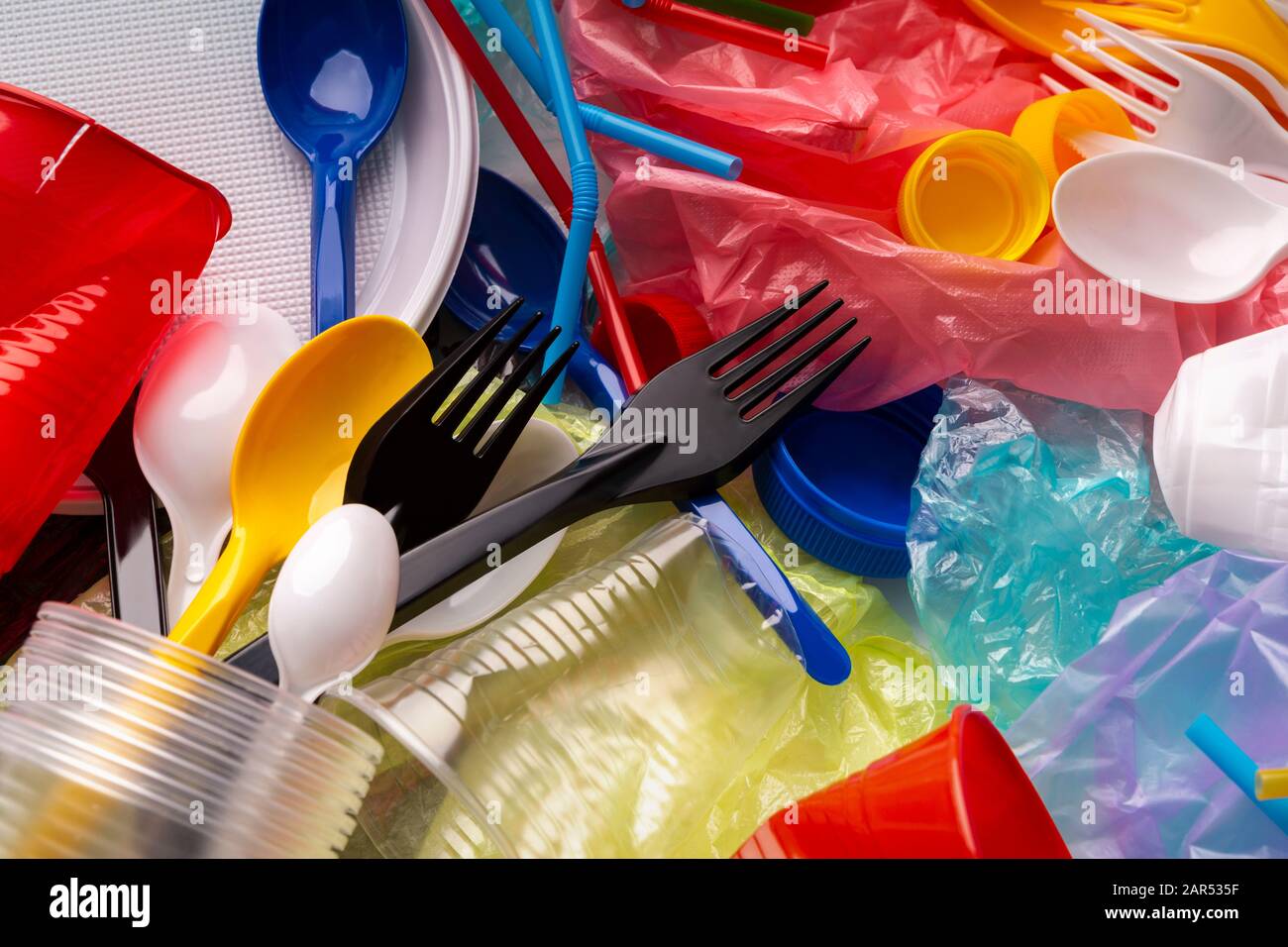 Disposable single use plastic objects such as bottles, cups Stock Photo ...