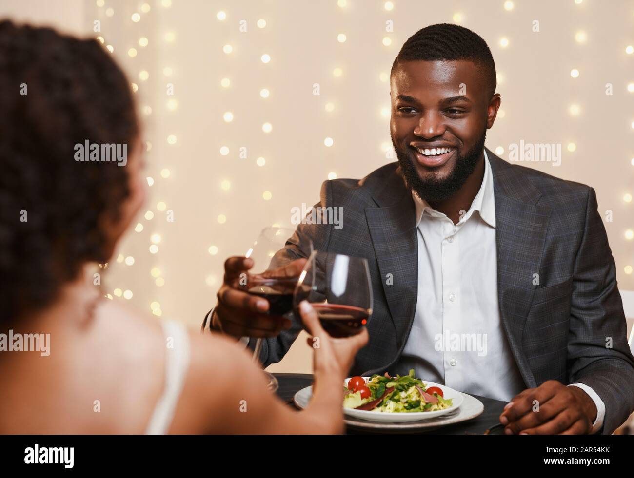 Man eating dinner suit hi-res stock photography and images - Alamy