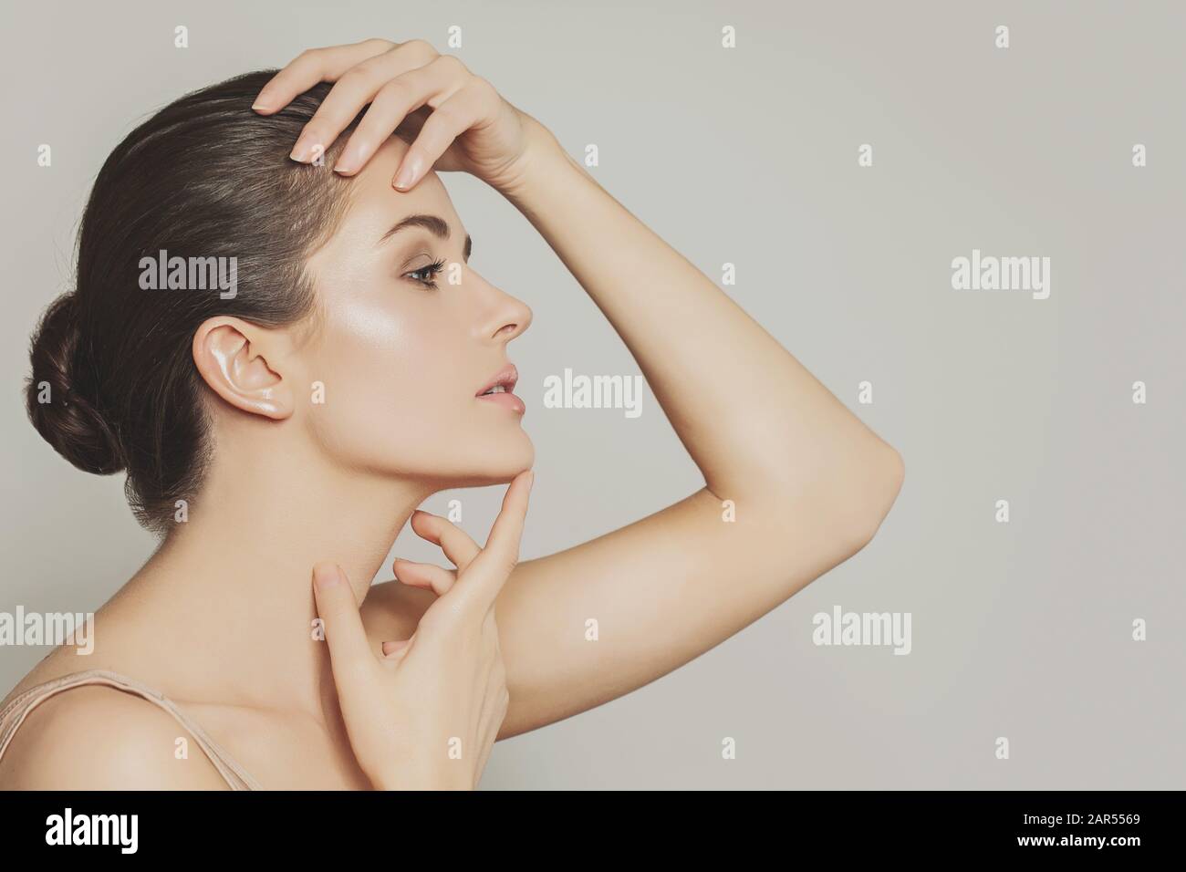 Female beauty. Young pretty woman face, profile Stock Photo - Alamy