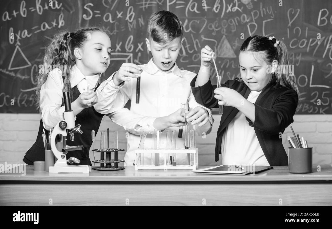 biology education. Little kids learning chemistry in lab. students ...