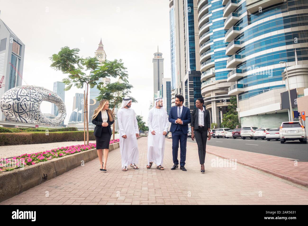 Multi-ethnic group of people on a business meeting in the UAE ...