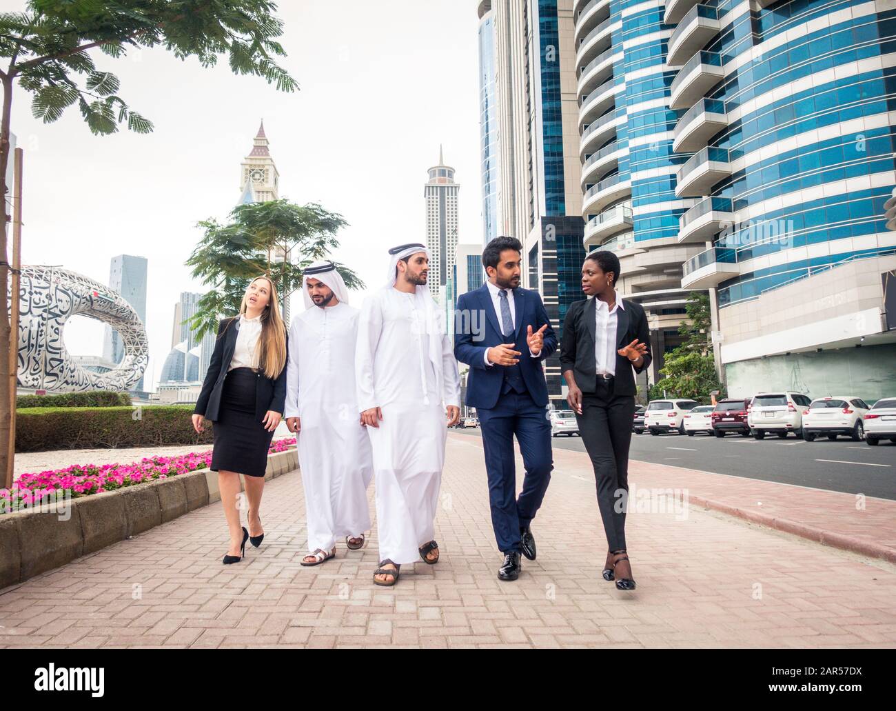 Multi-ethnic group of people on a business meeting in the UAE ...