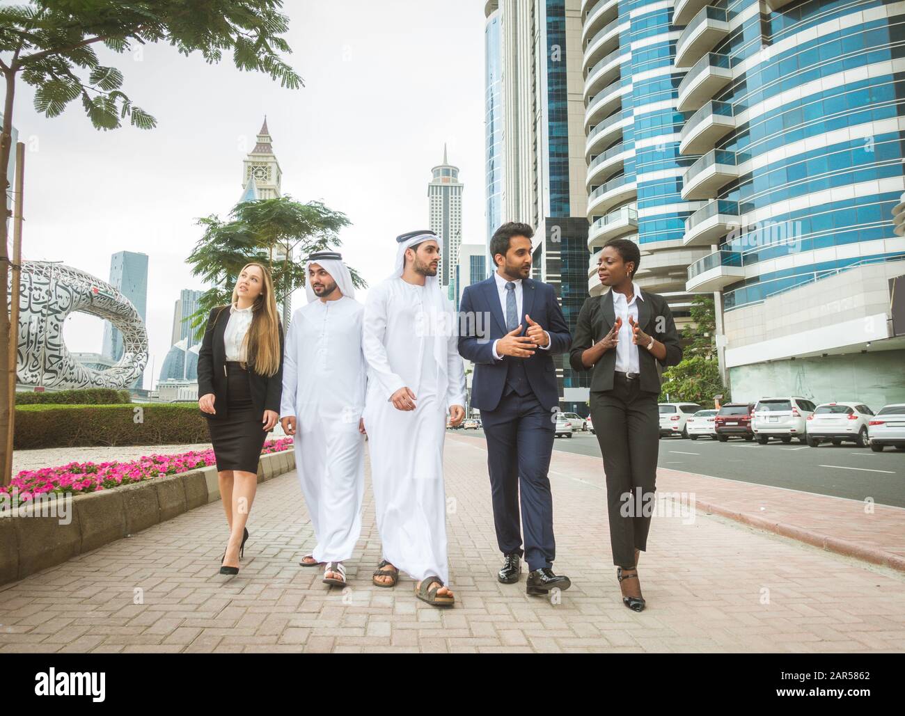 Multi-ethnic group of people on a business meeting in the UAE ...