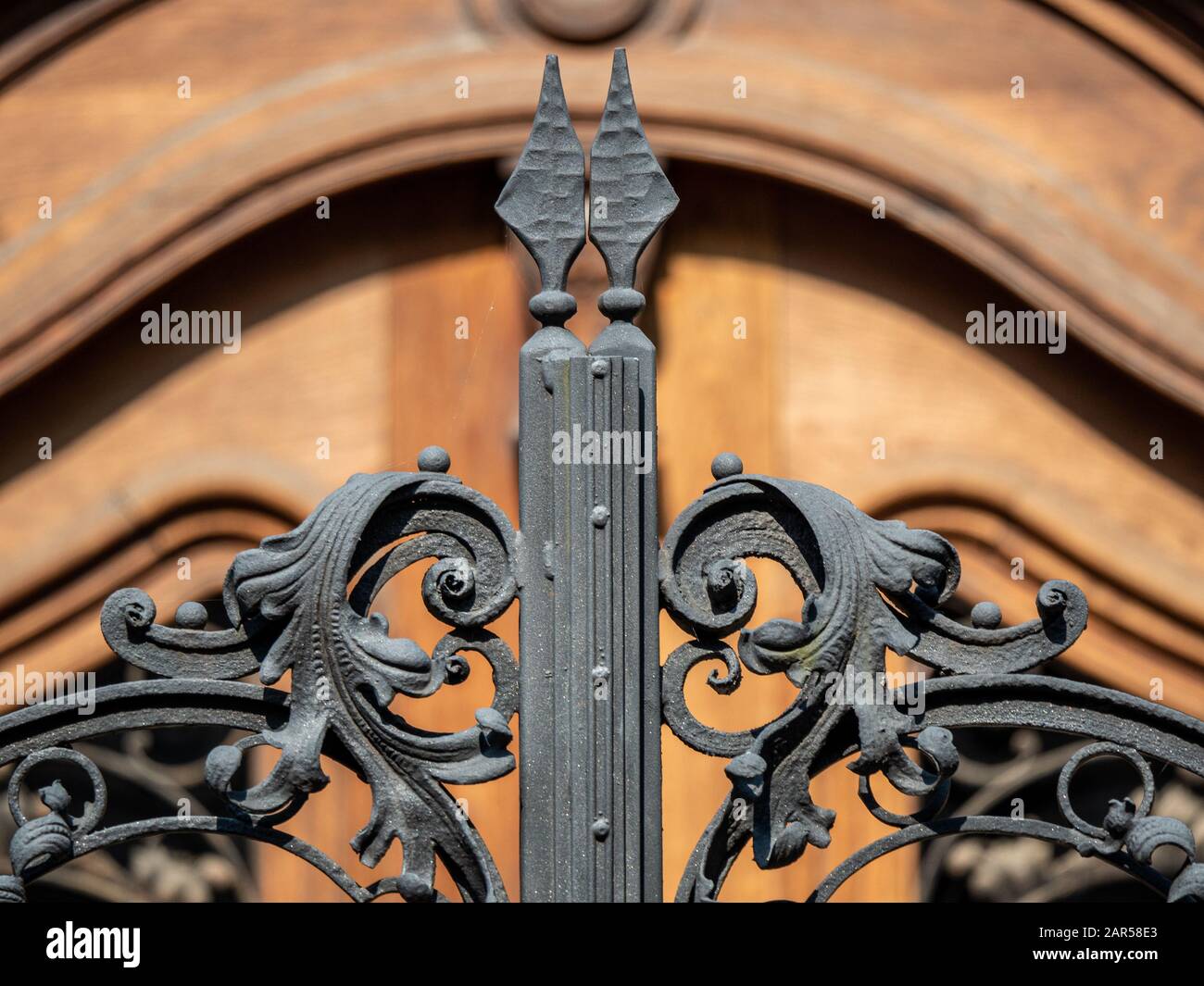 Old metal blacksmith gate Stock Photo - Alamy