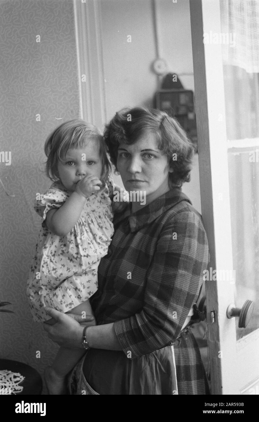 Hunger strike for new home. Woman with child Date: August 22, 1961 ...